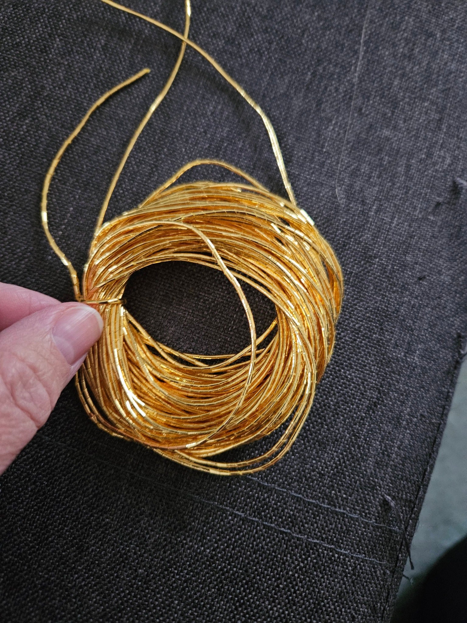 10 yard coil of gold plated couching cord – Shining Threads